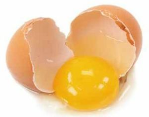 What happens when a raw egg is cooked?