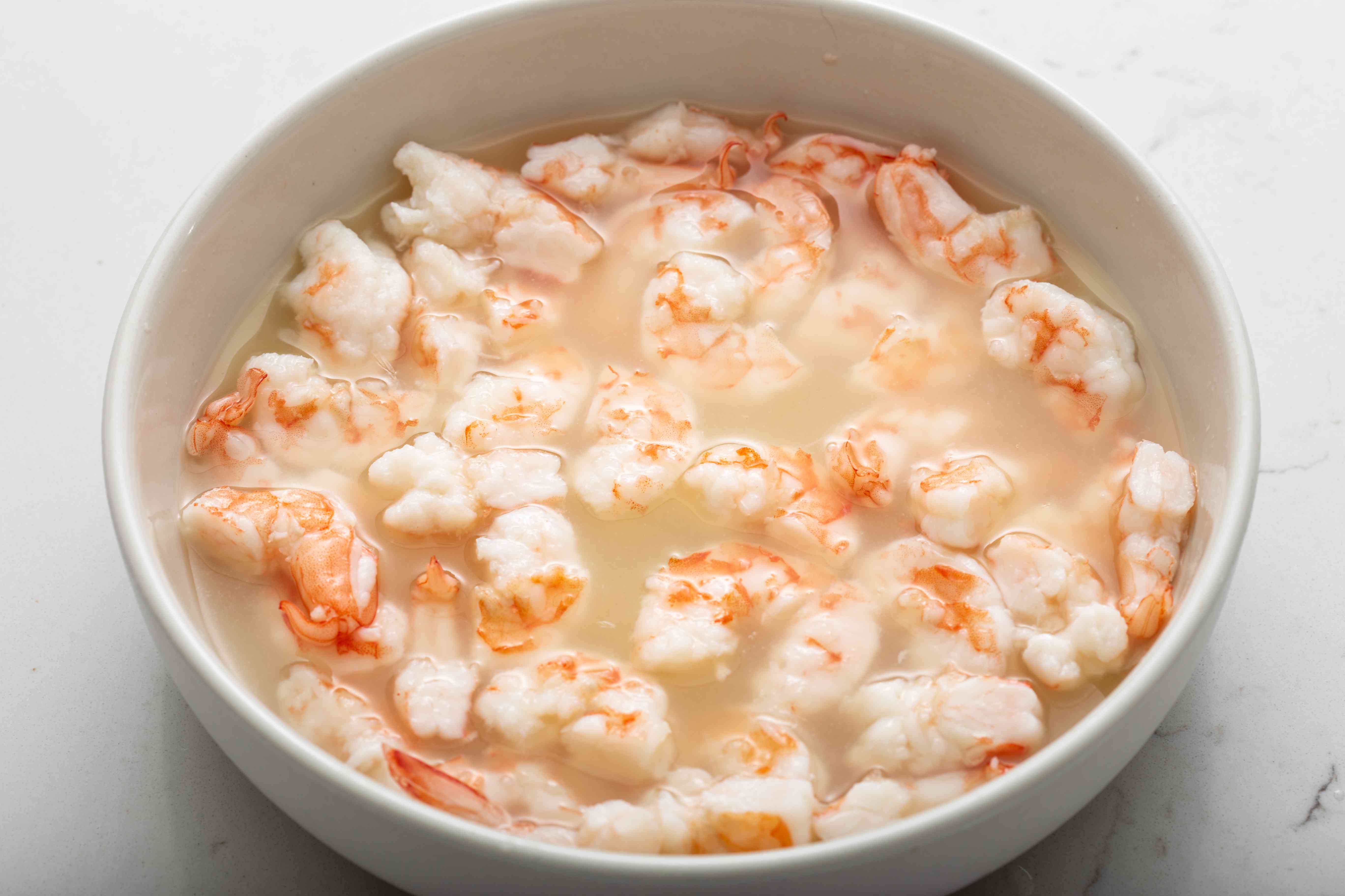 What happens when you soak shrimp in lemon juice?