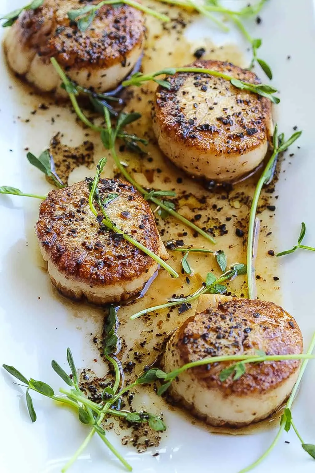 What is a serving of pan seared scallops?