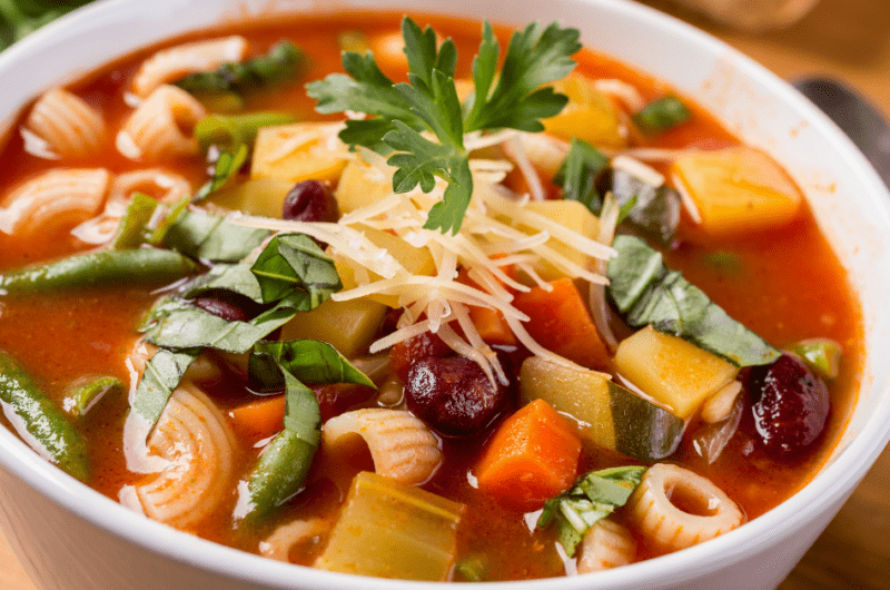 What is an example of a hearty vegetable specialty soup from Italy?