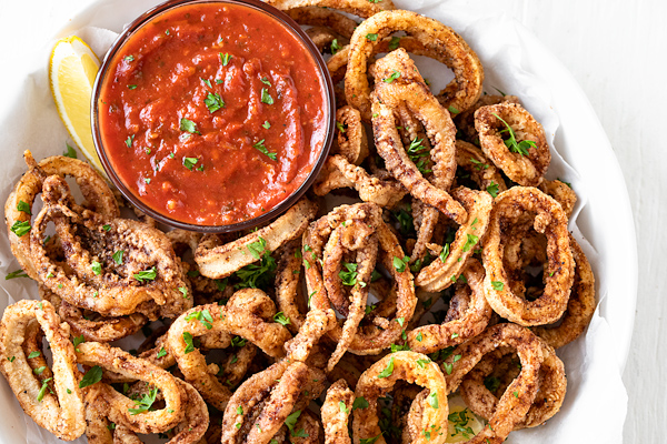 What is calamari normally served with?
