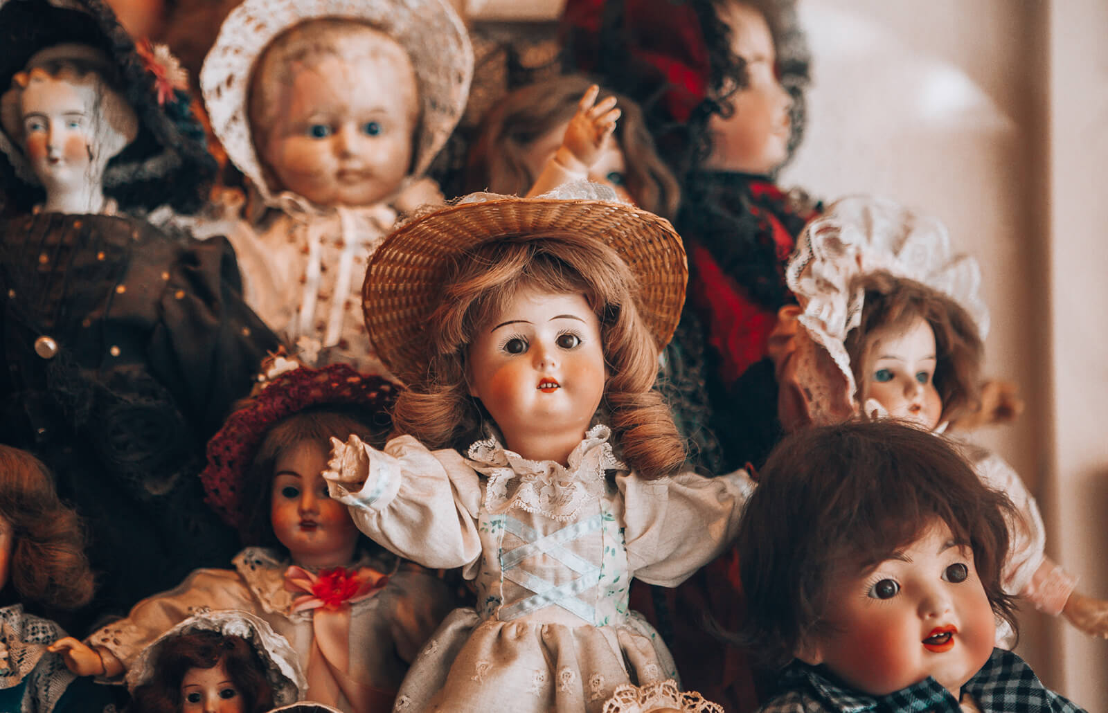 What is considered an antique doll?