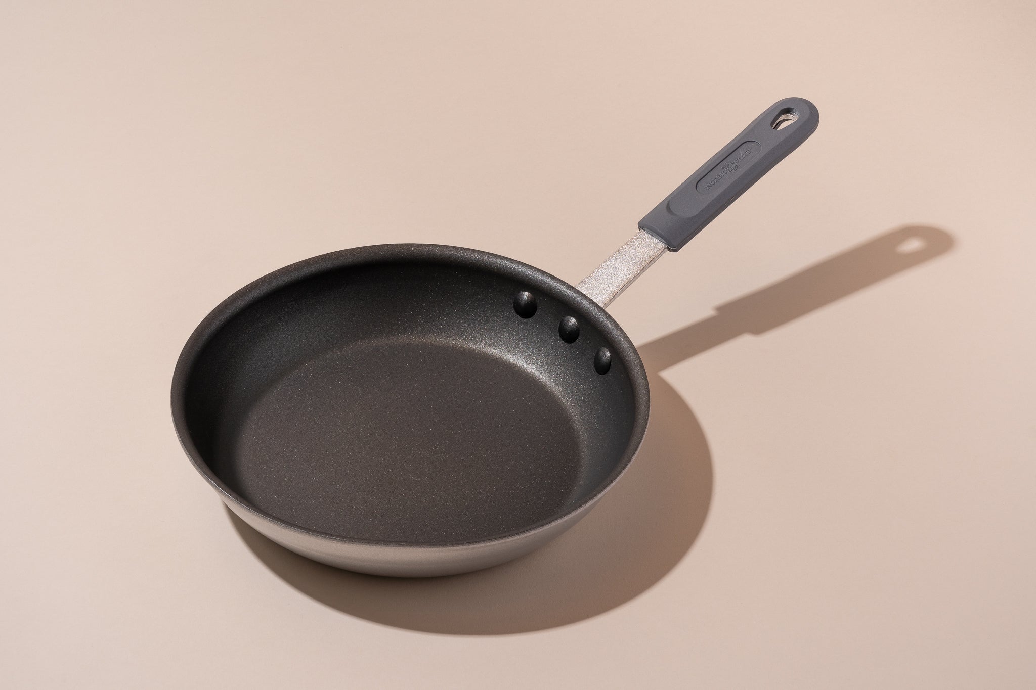 What is the best material for a non-stick frying pan?