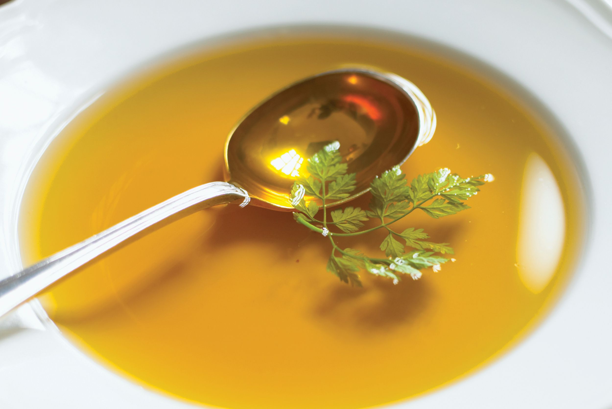 What is the best way to serve consommé?