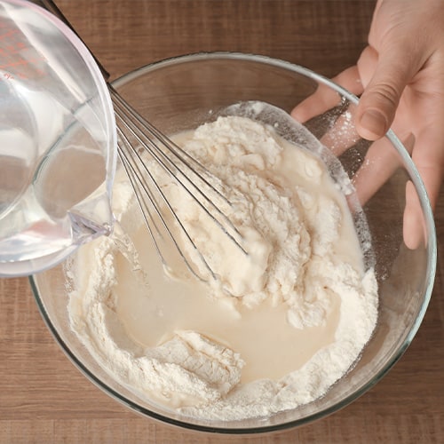 What is the difference between a pouring and a coating batter?