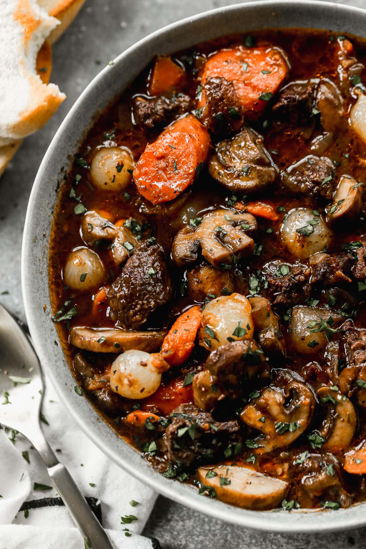What is the difference between beef stew and beef bourguignon?