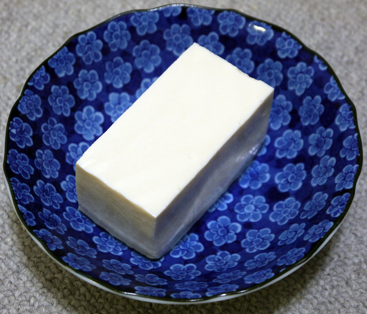 What is the ingredient that binds tofu to the food?