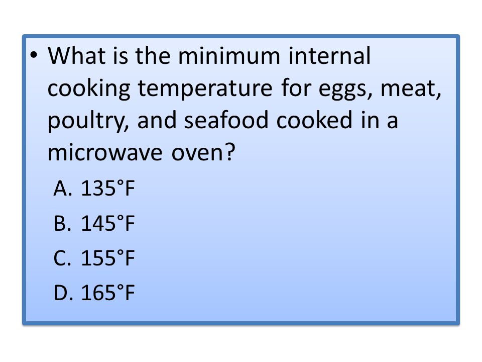 What is the minimum internal cooking temperature for seafood cooked in a microwave oven?