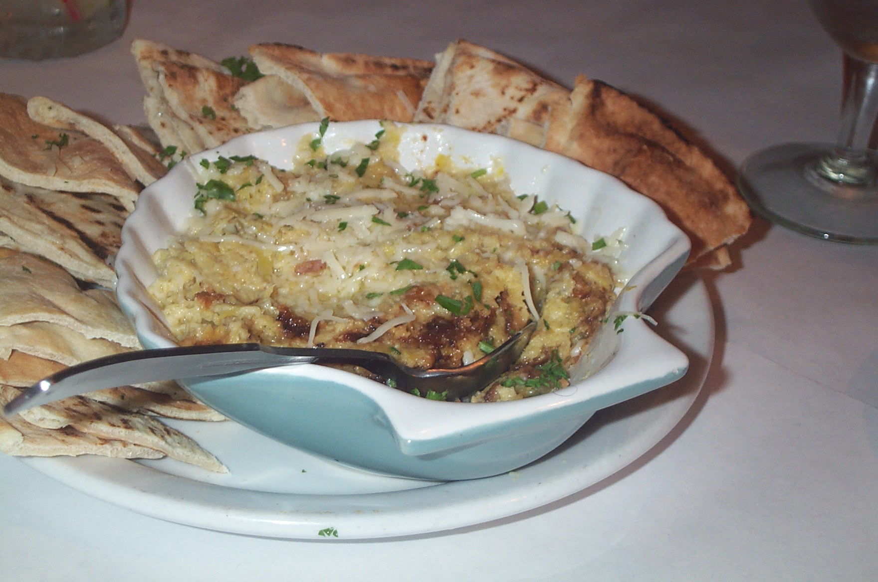 What is the origin of artichoke dip?