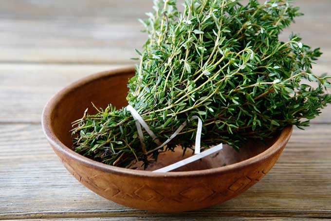 What is thyme good for in cooking?