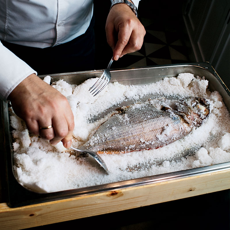 What kind of fish is baked with salt?