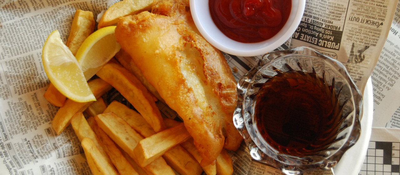 What kind of vinegar is served with fish and chips?