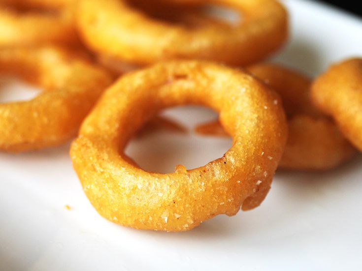 What role does batter and breading play in fried foods?