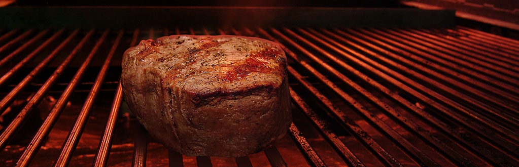 What temperature does Ruth's Chris steakhouse cook their steaks at?