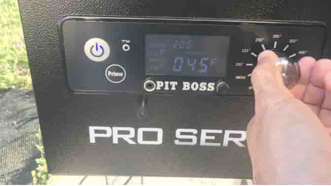 What temperature is the smoke setting on pit boss vertical smoker?