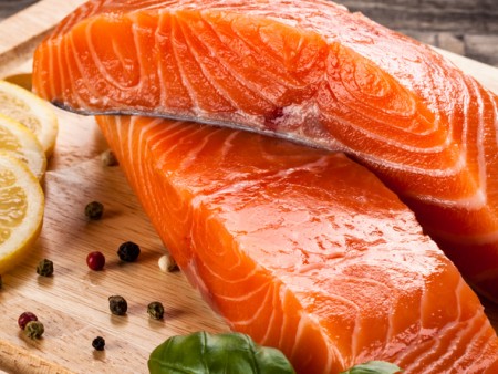 What temperature kills parasites in salmon?