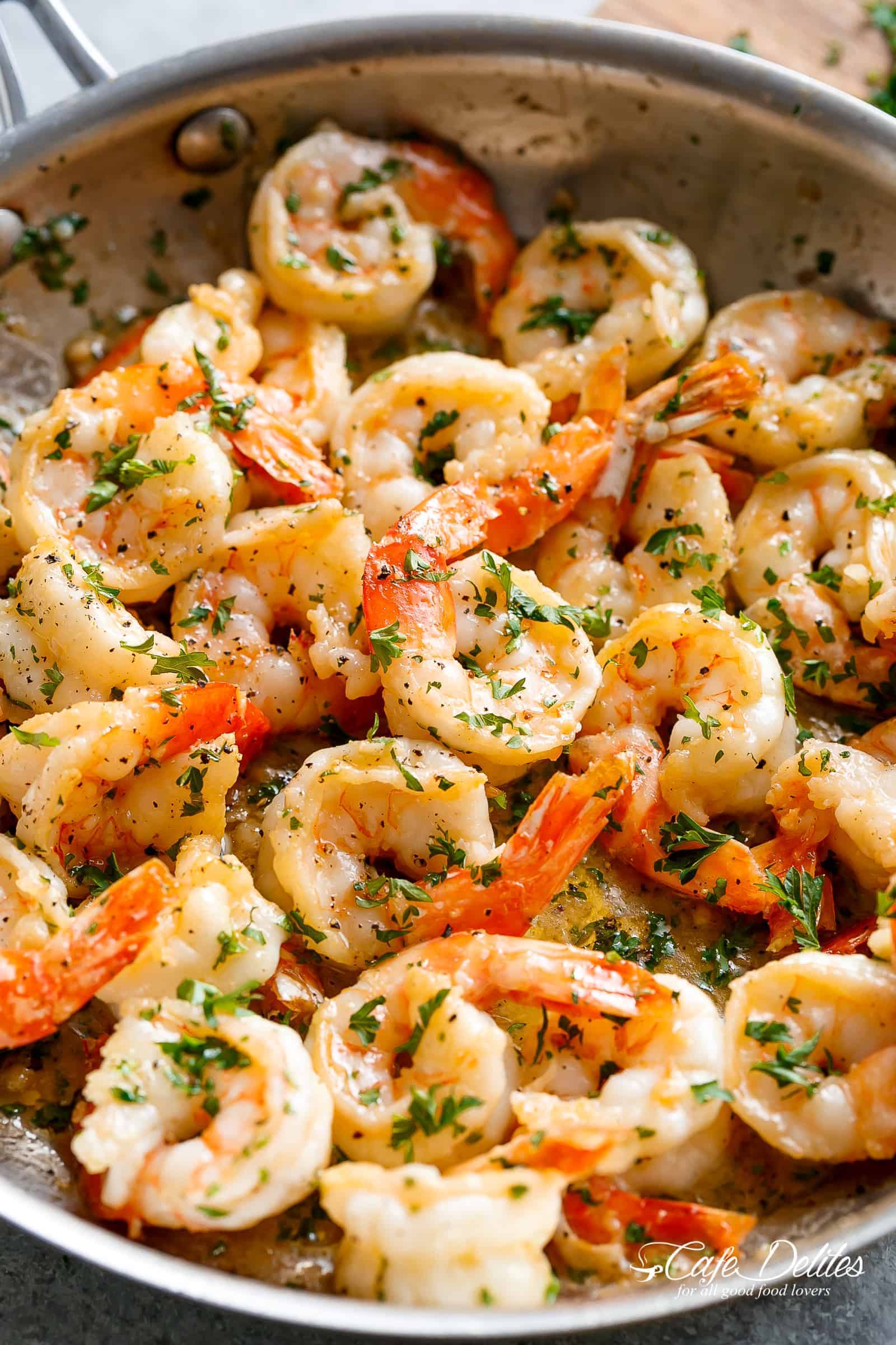 What temperature should scampi be when cooked?