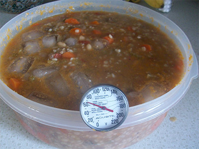 What temperature should soup be stored at?
