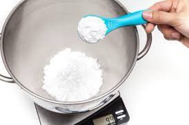 What volume is 100g of flour?