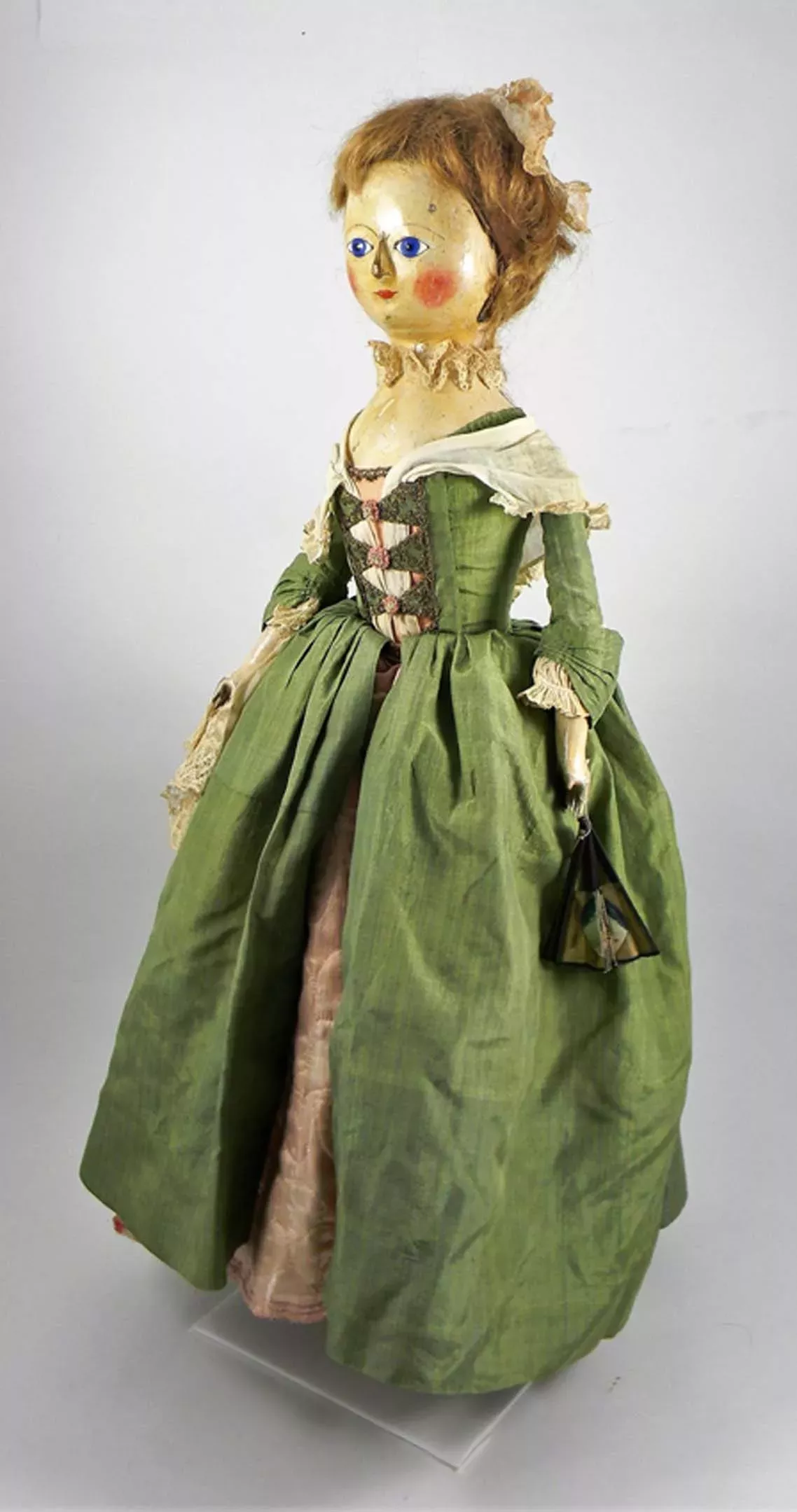 What were dolls made of in the 1700s?