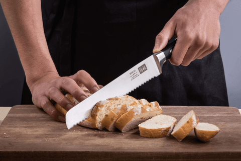 When cutting bread you should use which knife?