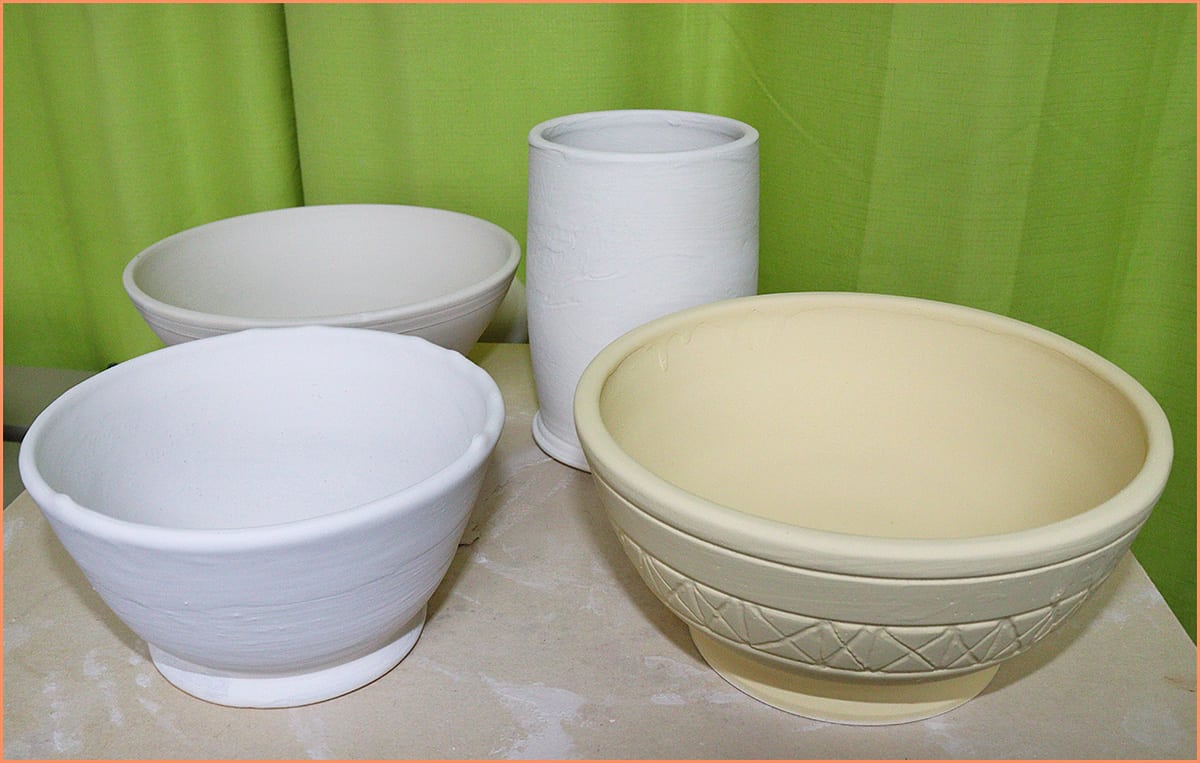 When loading a kiln What is the difference between bisque and glaze?