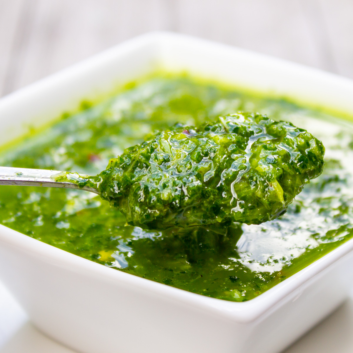 When should fresh herbs be added to a sauce?