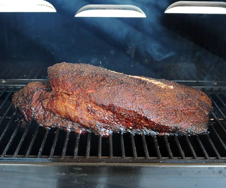 When should I remove the brisket from the grill?