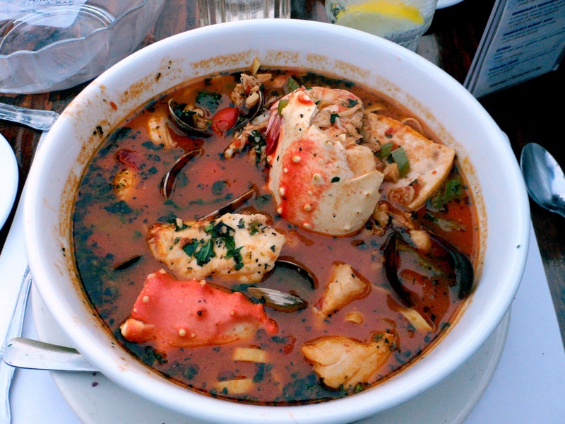 Where did seafood stew originate?