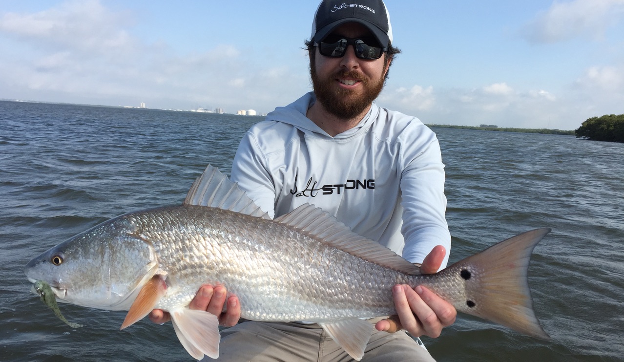 Where do redfish like to hang out?