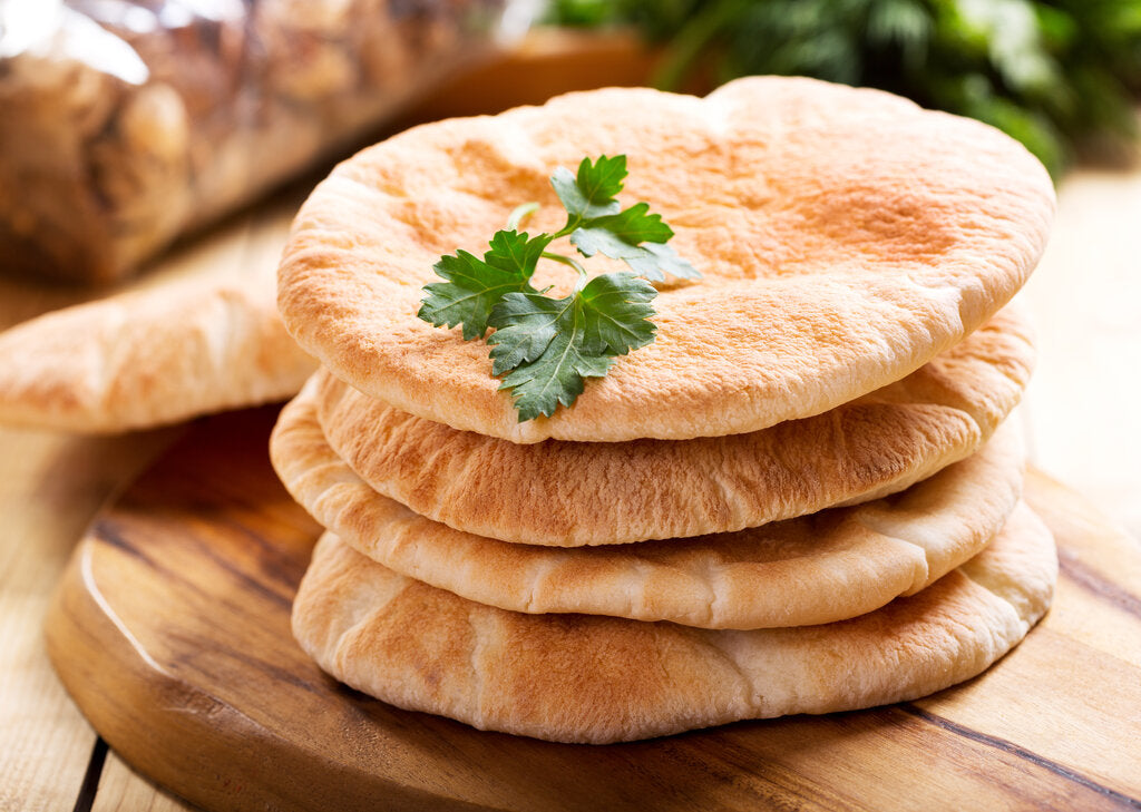 Which is healthier pita or flatbread?