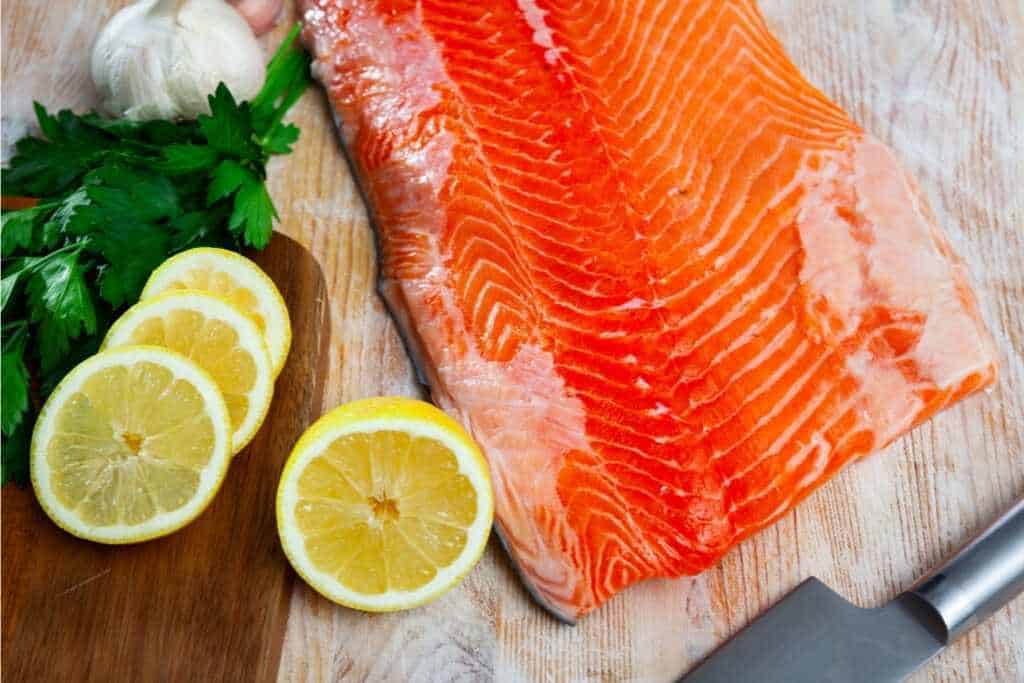 Which is healthier salmon or sea bass?