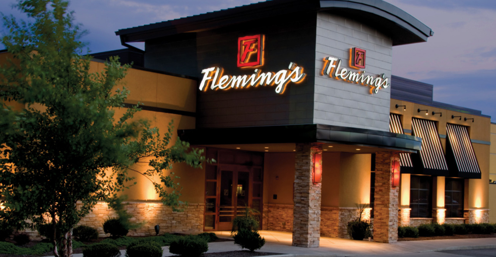 Who owns Flemings Steakhouse?
