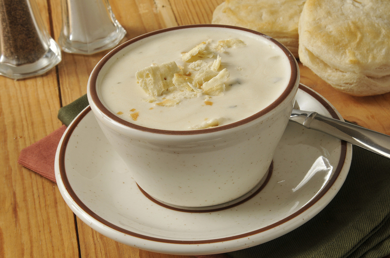 Why are tomatoes not allowed in clam chowder?
