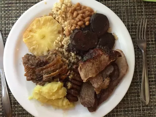 Why do Brazilians eat dinner so late?