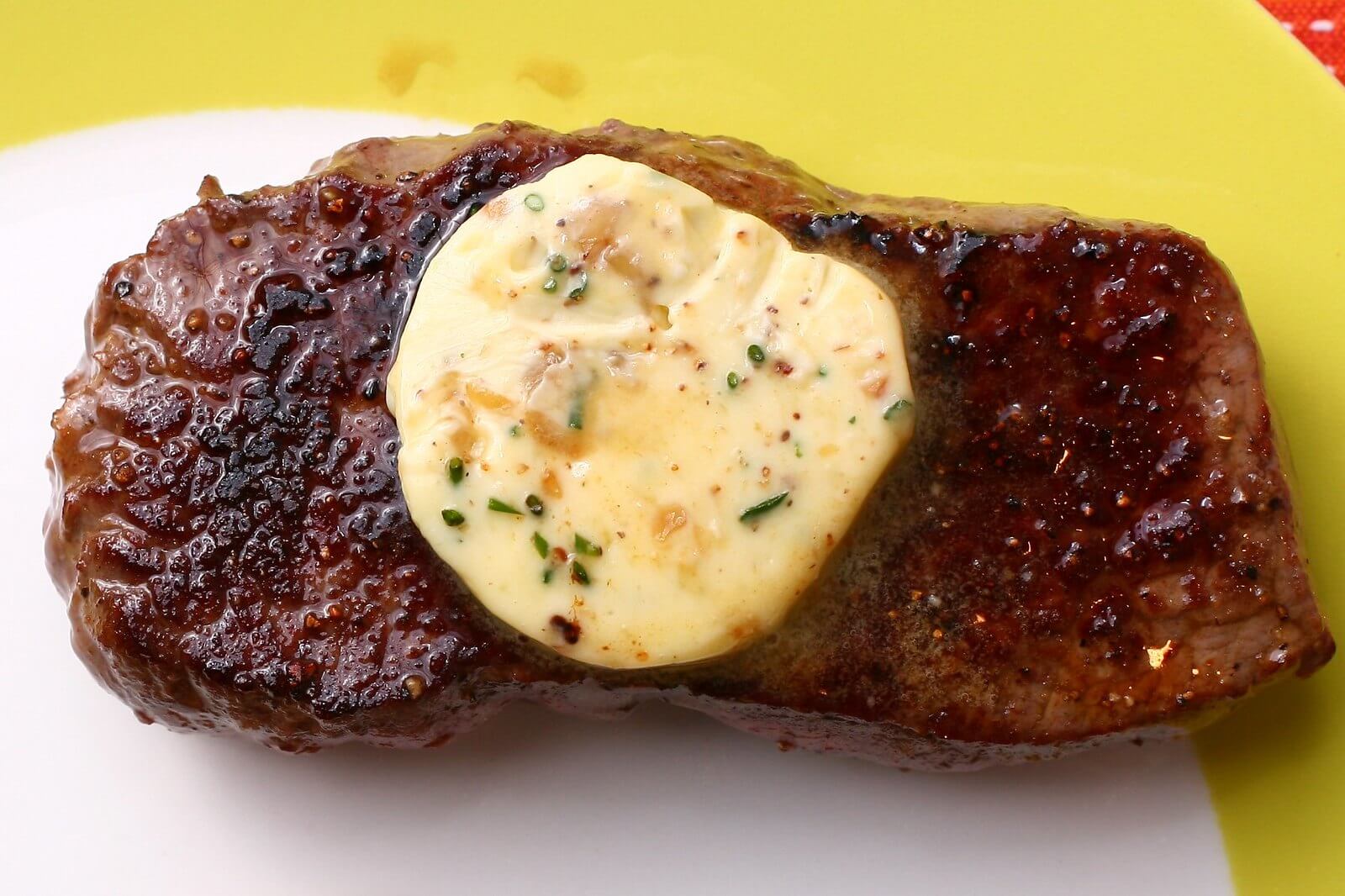 Why do chefs put butter on steak?