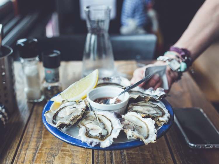 Why do cooked oysters make me sick?