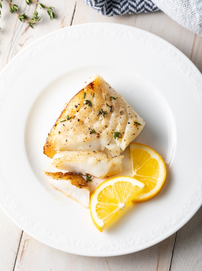 Why do fish fillets taste better when cooked in liquid?