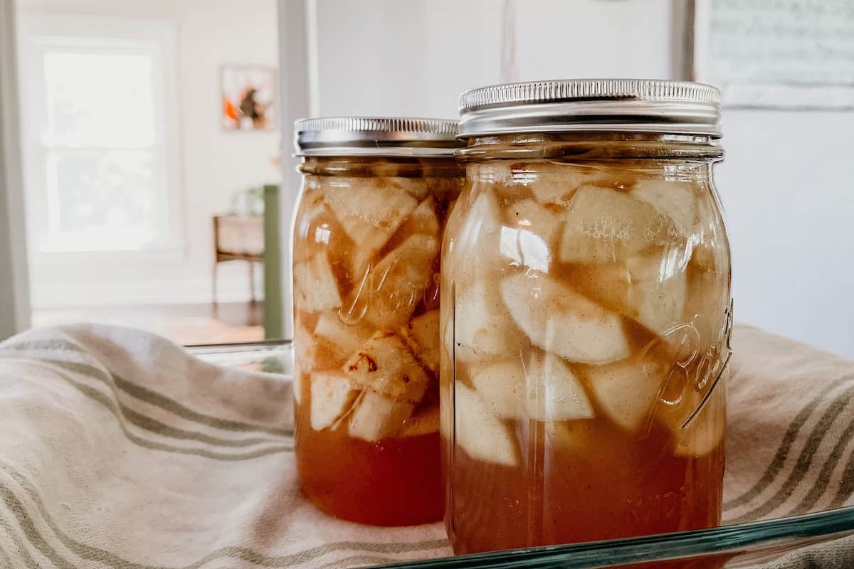 Why do jars have to be covered with water when canning?