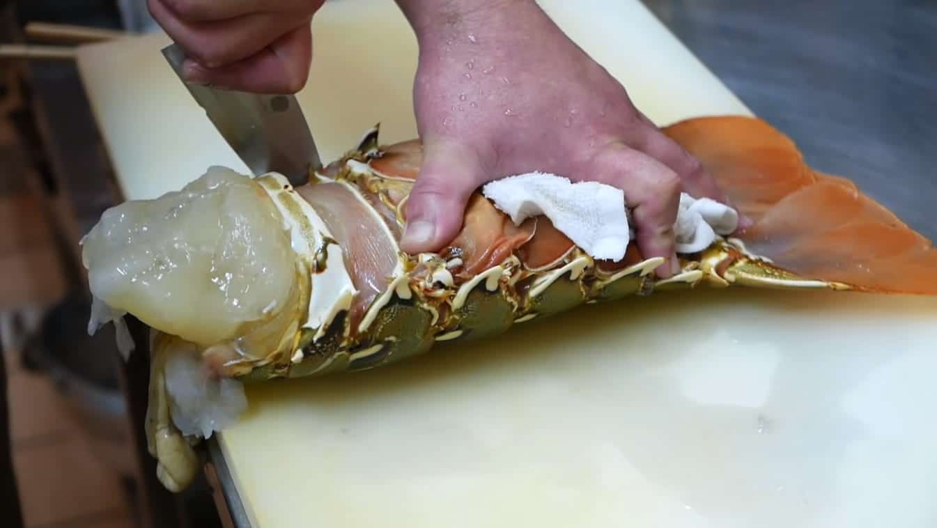 Why do lobster tails sometimes have a strong smell of ammonia?