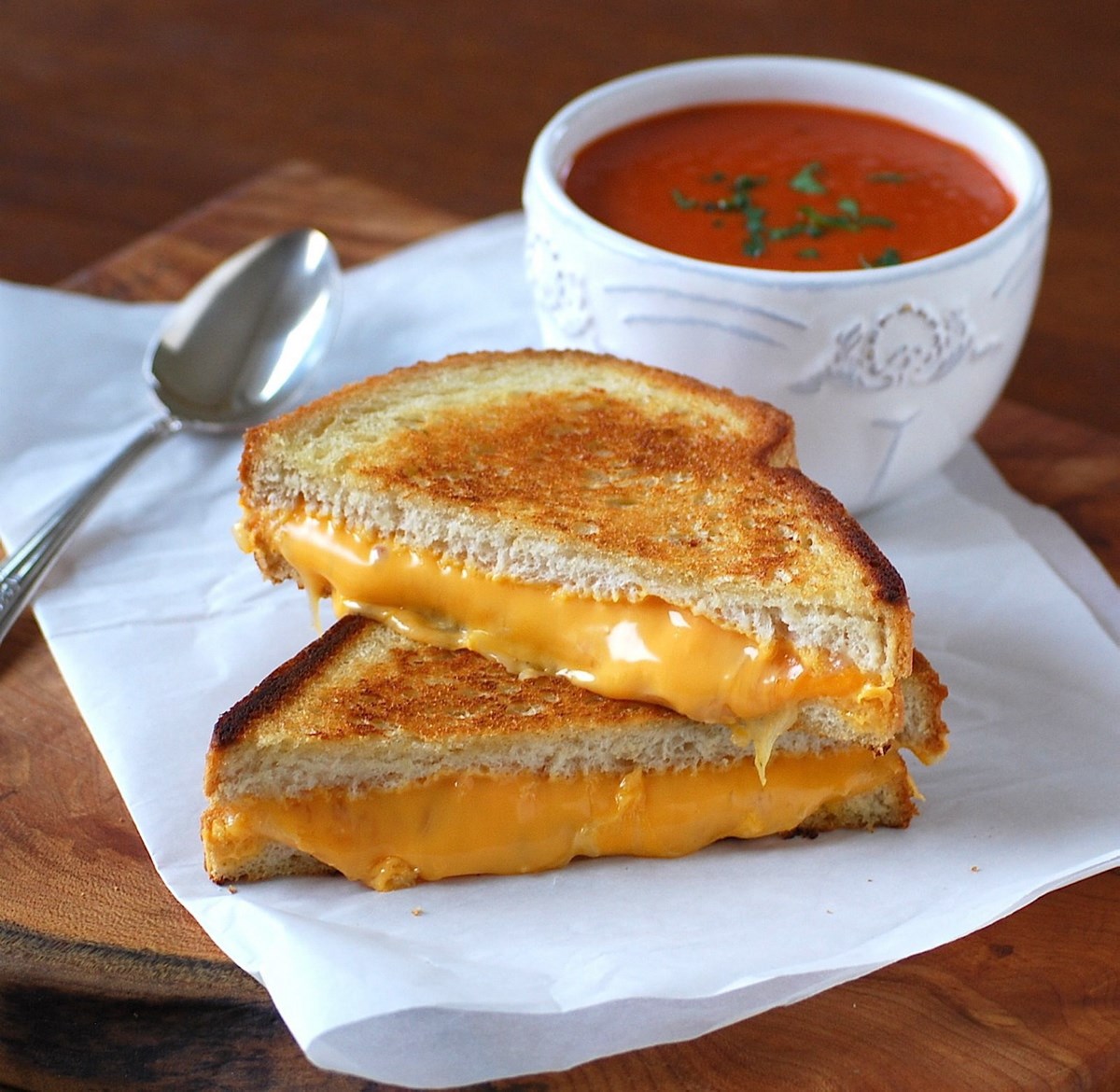 Why do people Pair grilled cheese and tomato soup?