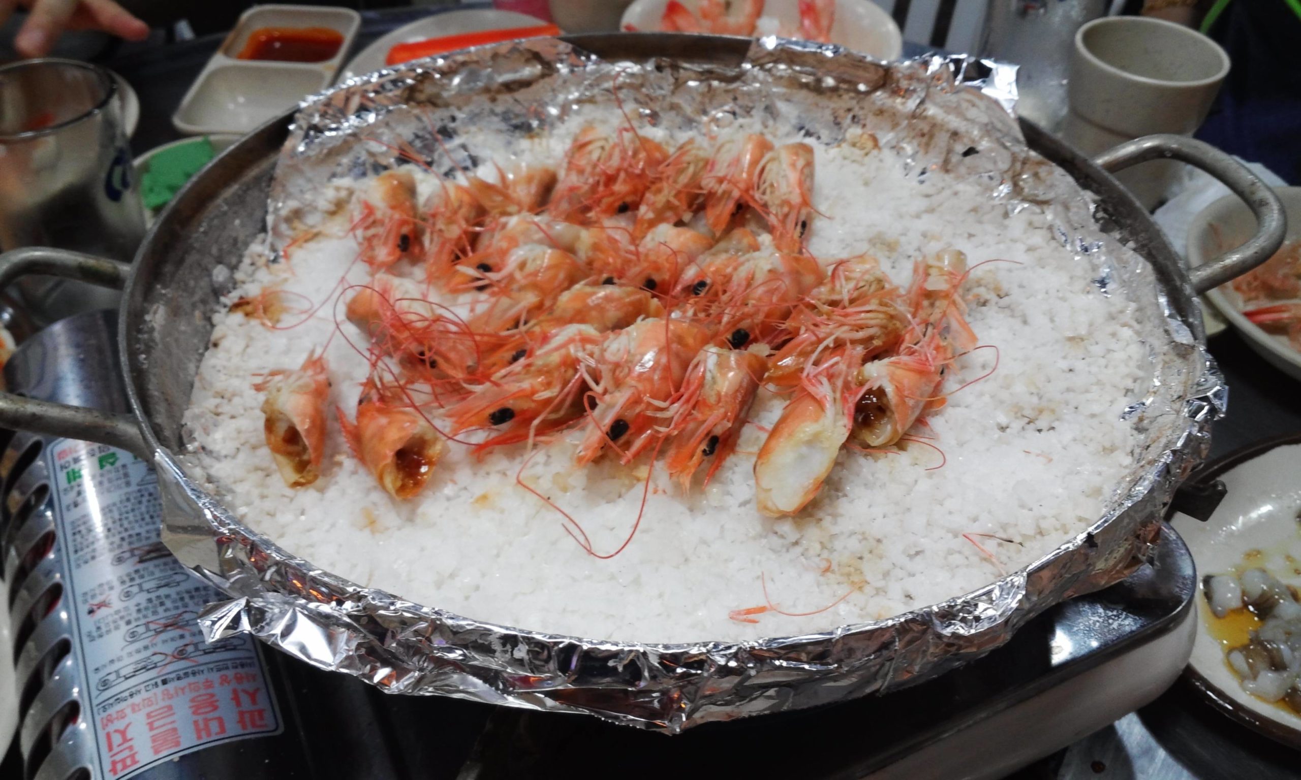 Why do restaurants leave the shell on shrimp?