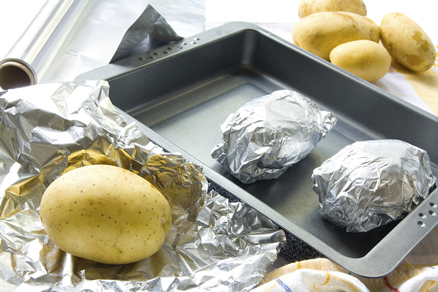 Why do restaurants wrap potatoes in foil to bake?