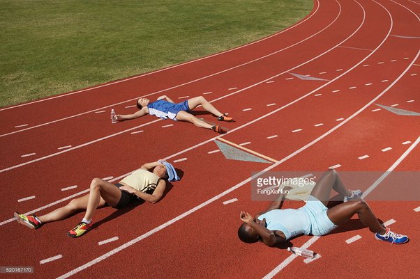 Why do runners lay down after a race?