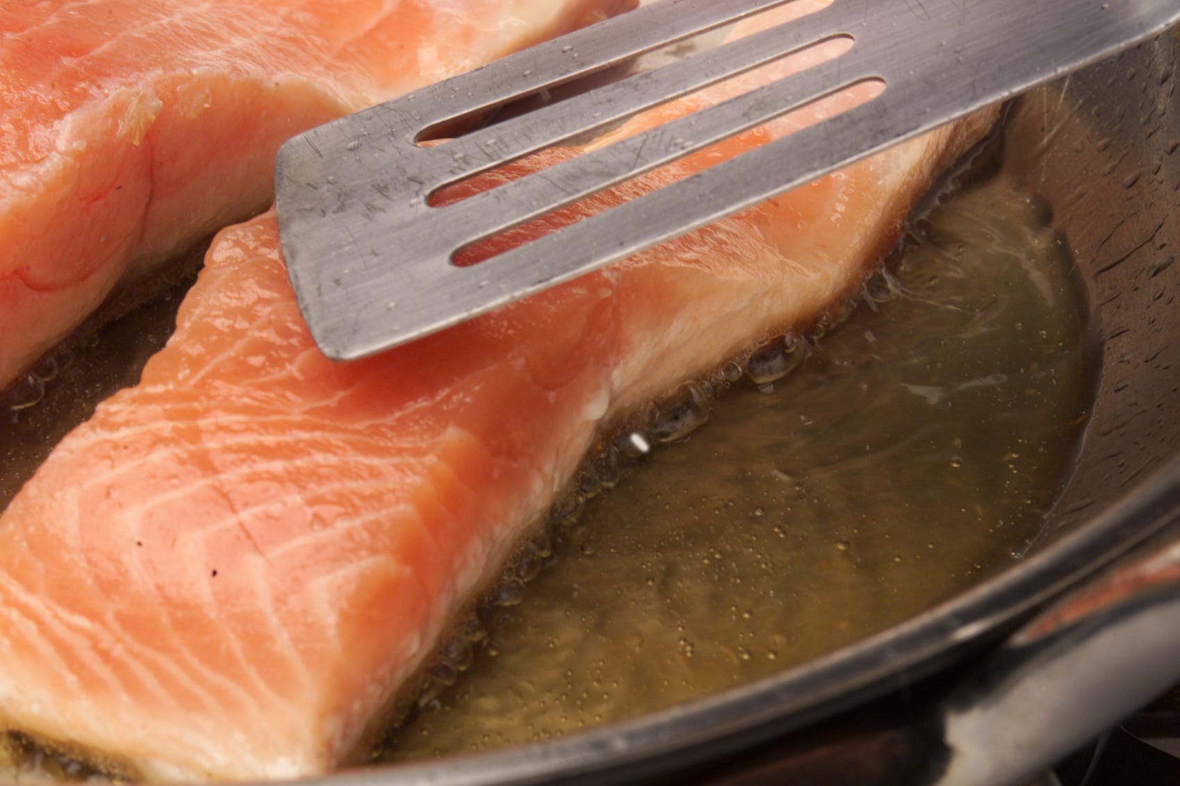 Why do salmon fillets have white lines?