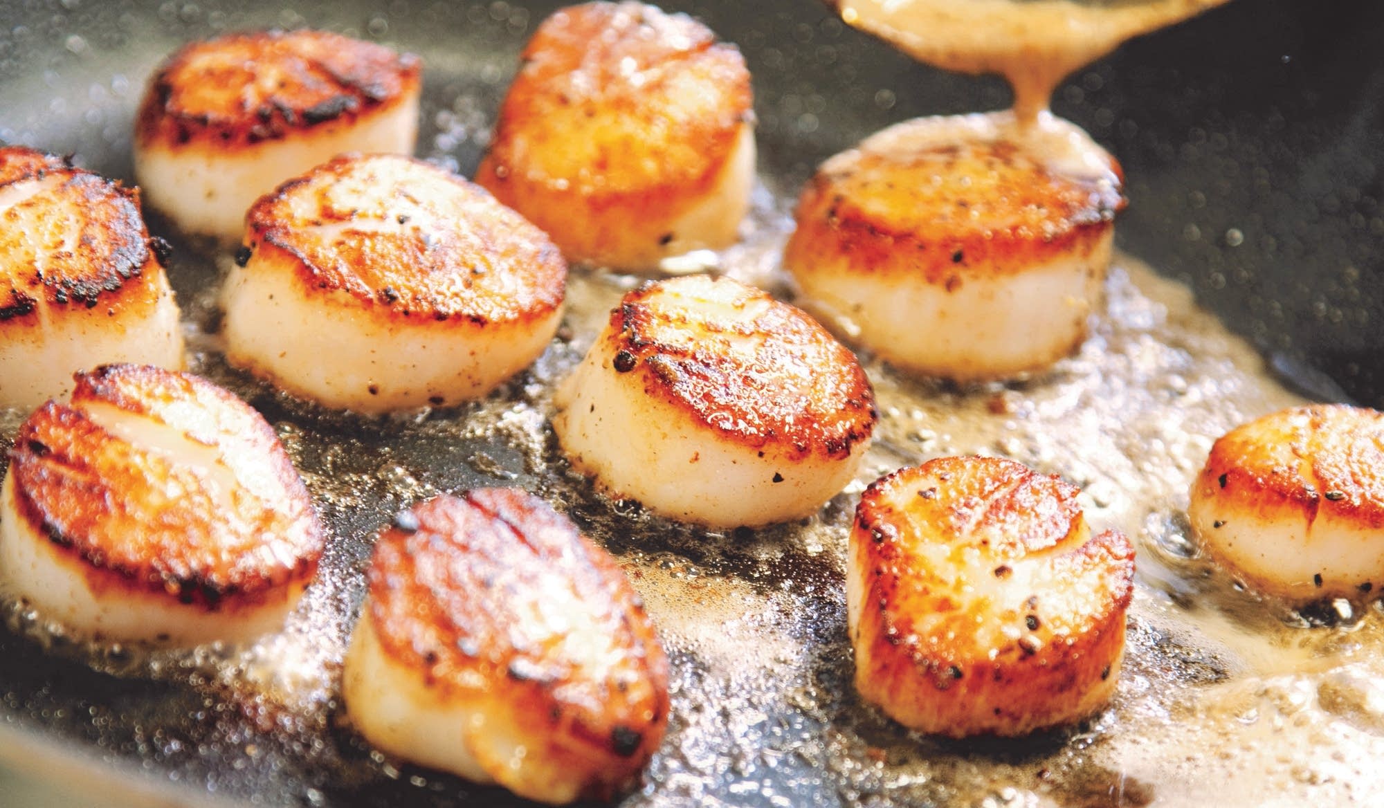 Why do scallops need to be cooked quickly?