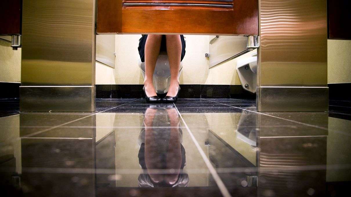 Why do some people avoid pooping in public bathrooms?