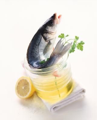 Why do we use lemon juice on fish?
