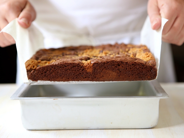 Why do you grease parchment paper?