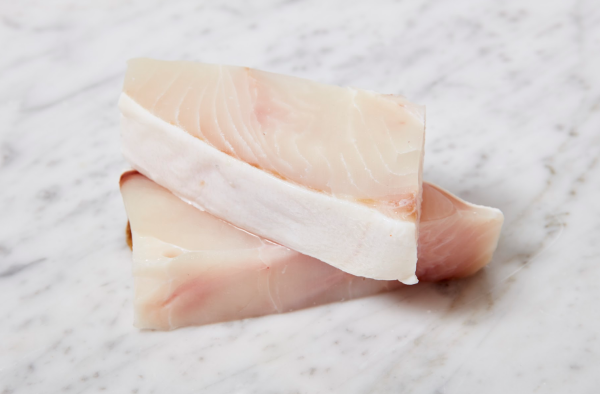 Why do you Grill halibut skin up and not down?